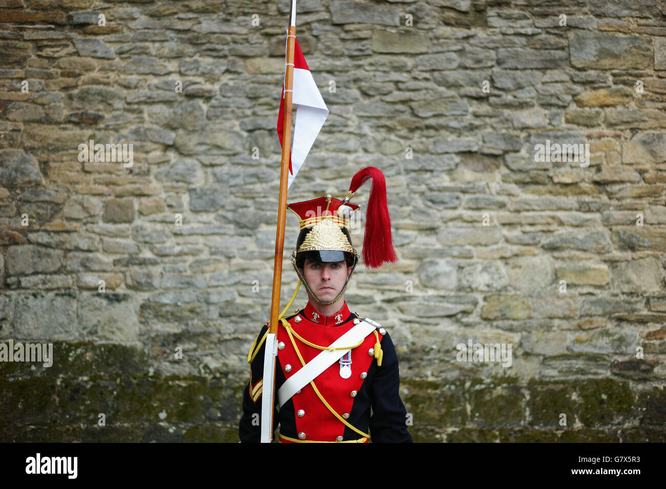 An honour guard of Lancers await the arrival of Queen Elizabeth II and ...