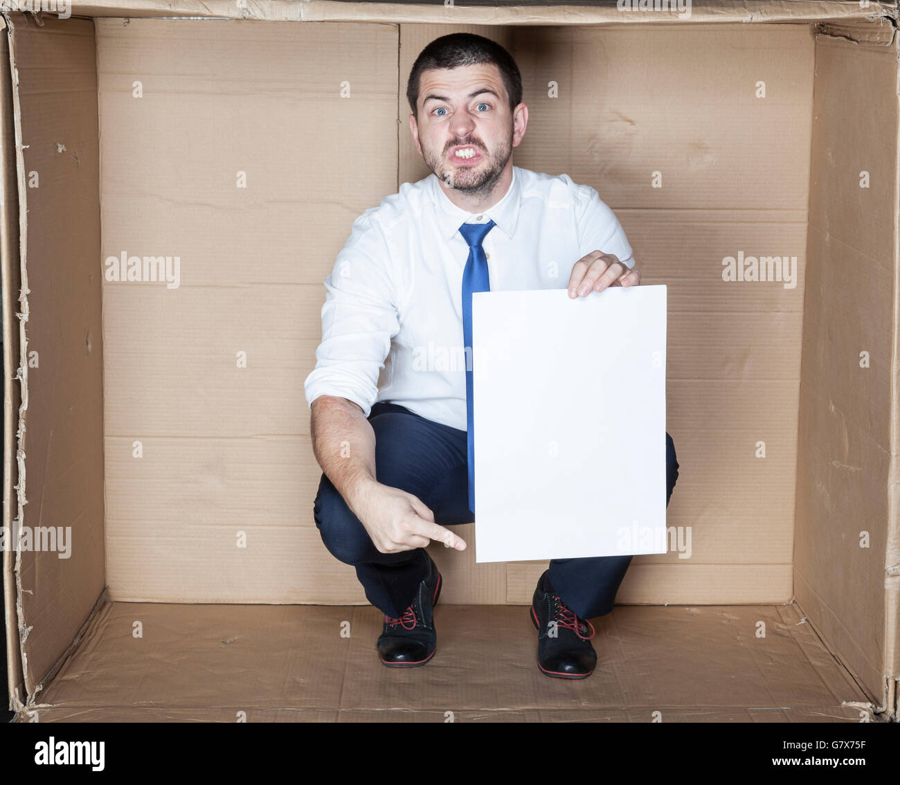 angry businessman pointing paper Stock Photo - Alamy