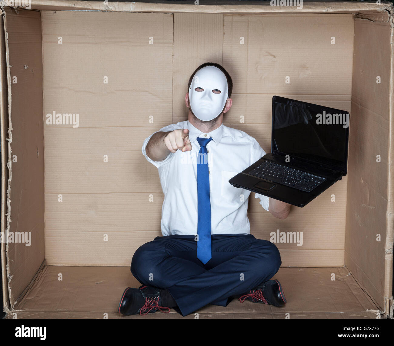 hacker in mask pointing at you Stock Photo - Alamy