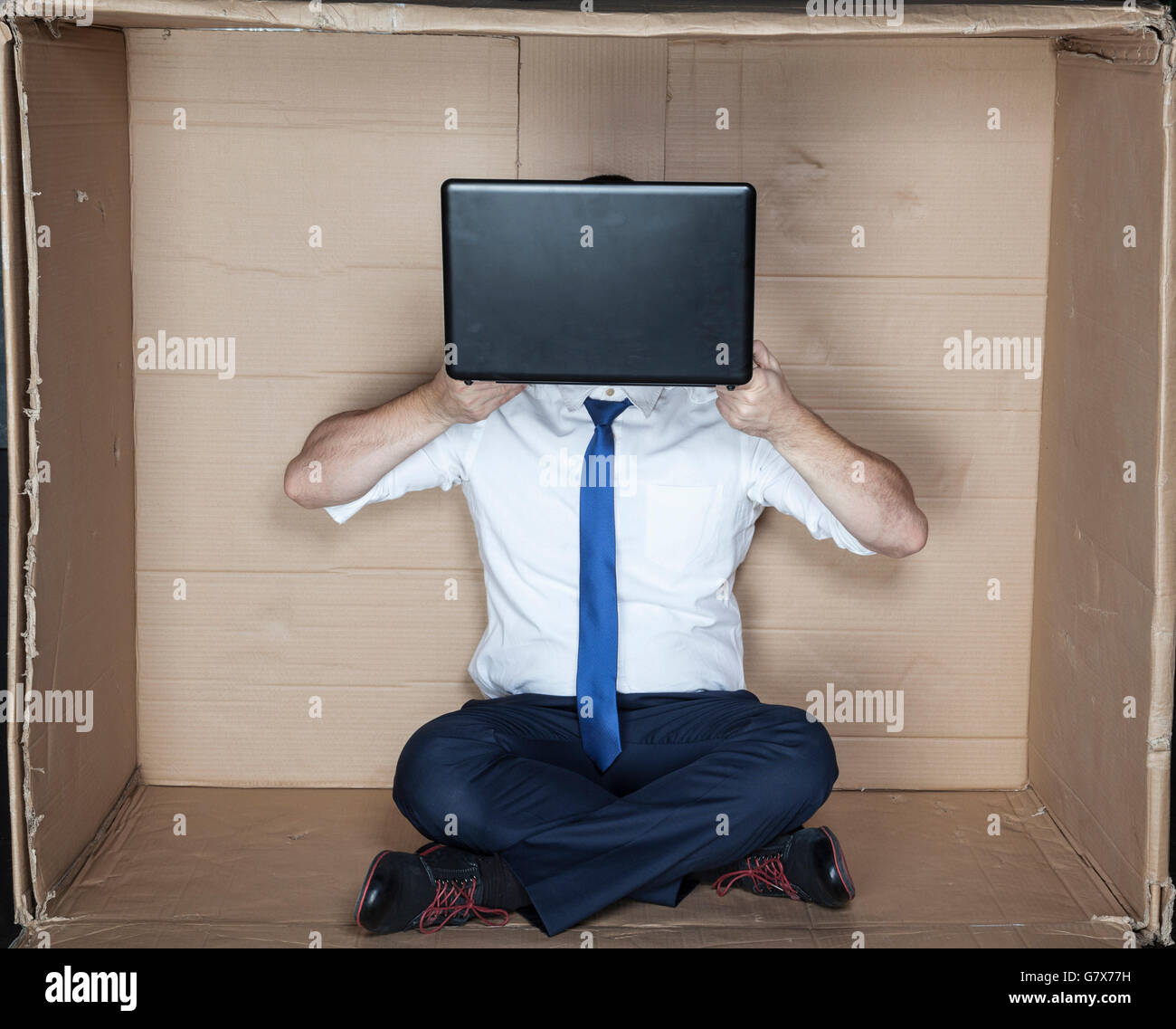 Hacker behind computer hi-res stock photography and images - Alamy