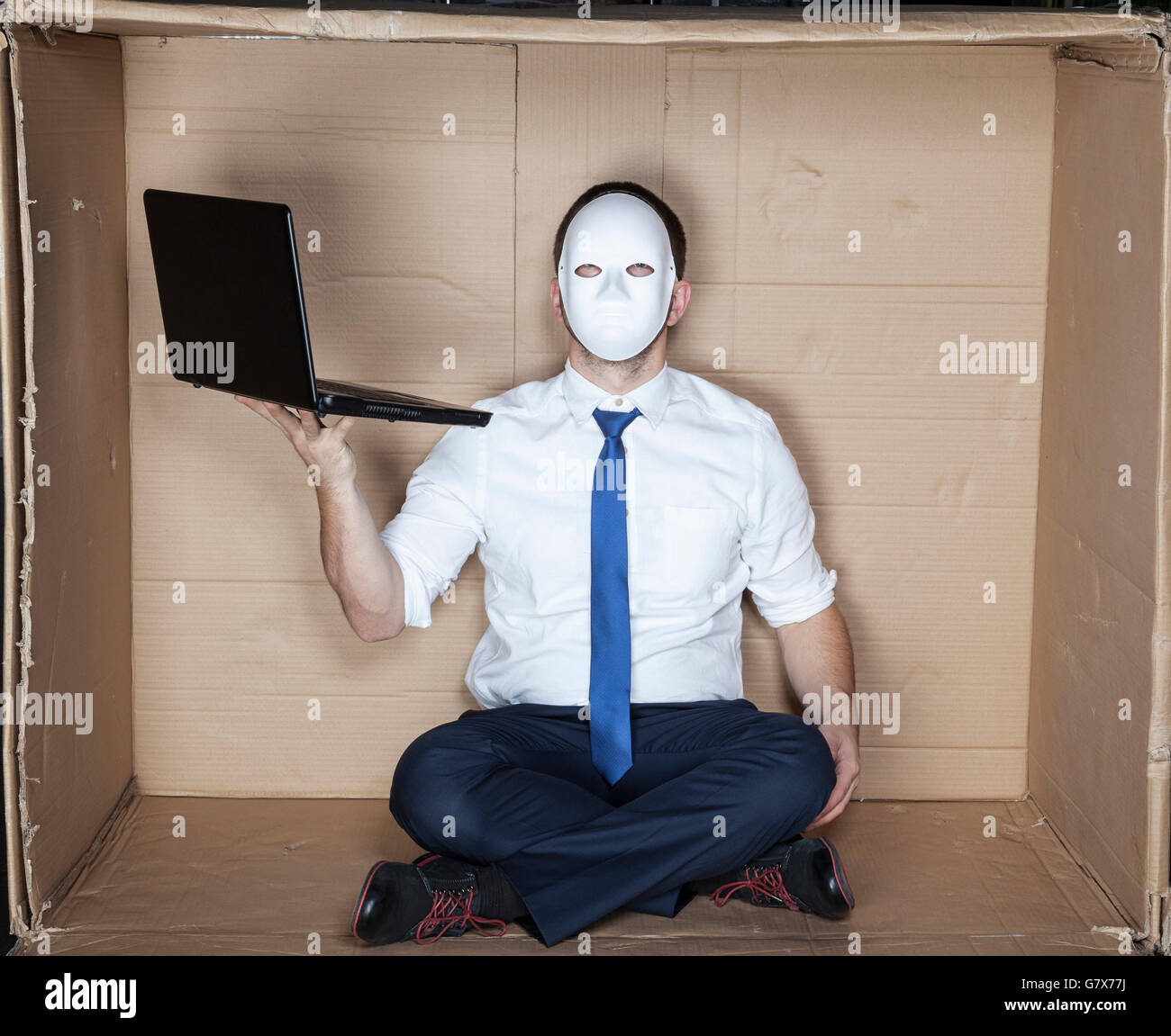 hacker wearing mask and tie Stock Photo - Alamy
