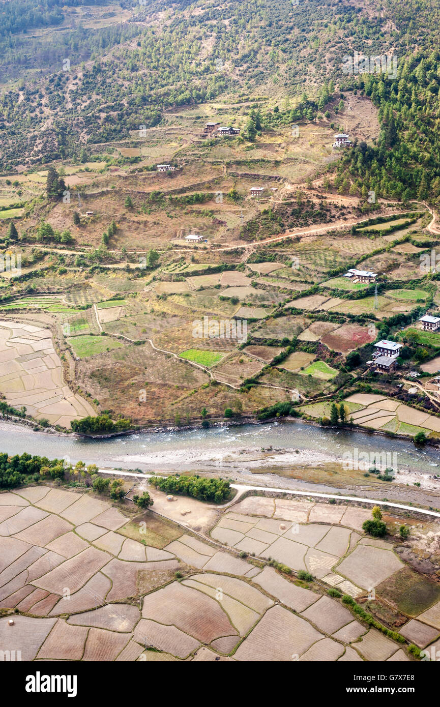 Aerial view of Bhutan landscape dotted with houses and buildings in ...