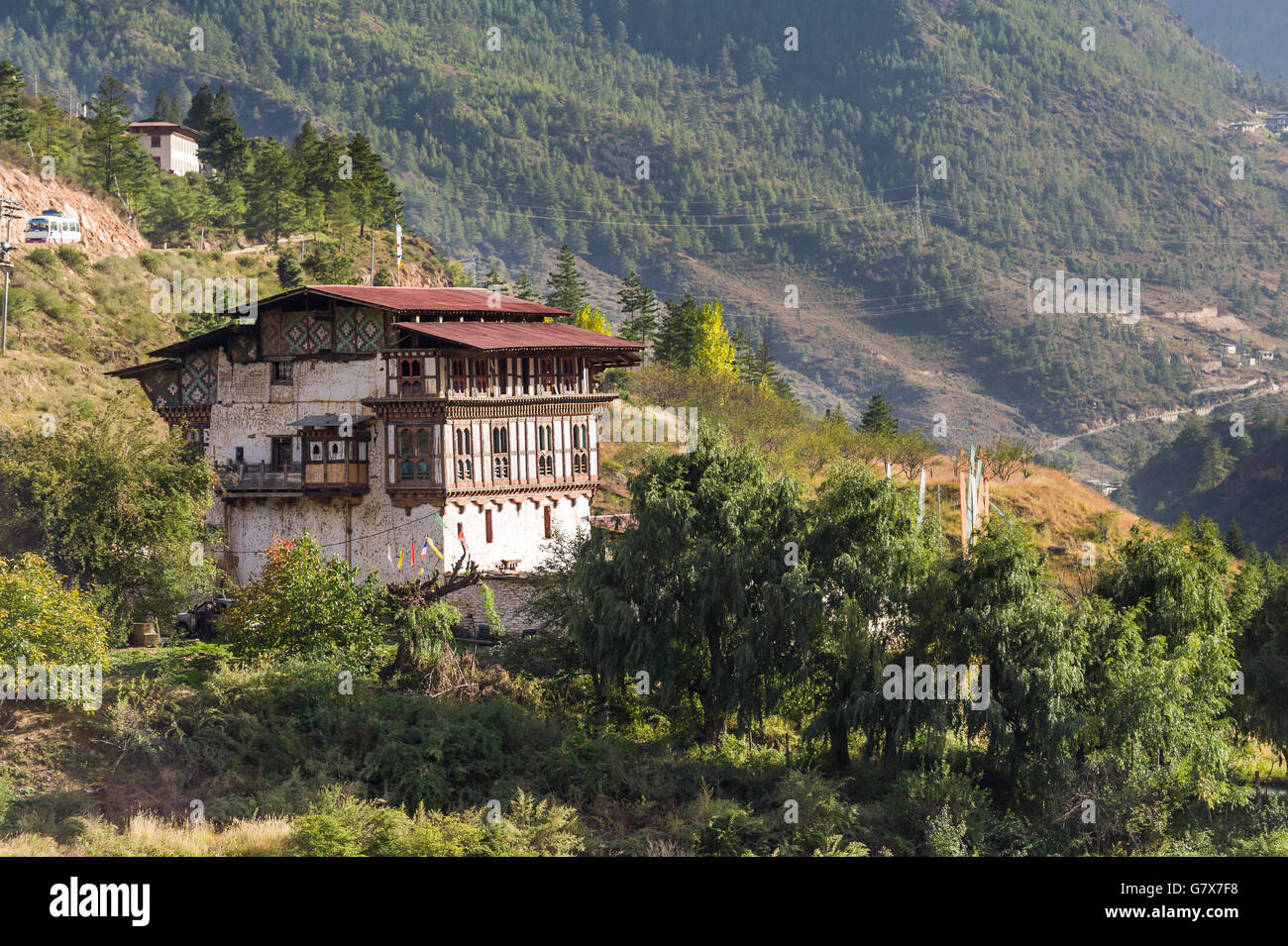Unique and historical Bhutanese house in the mountains Stock Photo - Alamy