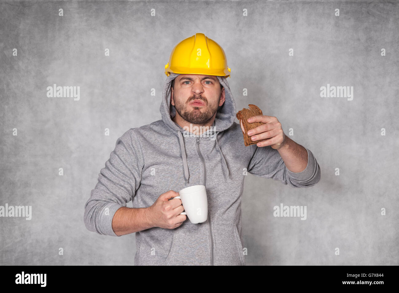angry worker ate a sandwich Stock Photo - Alamy