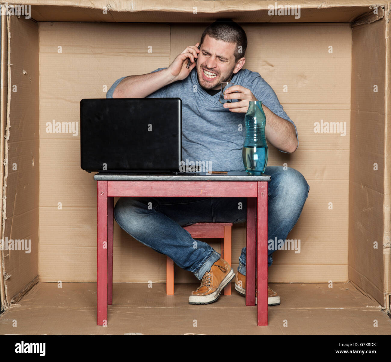 drunk intern talking on the phone Stock Photo - Alamy