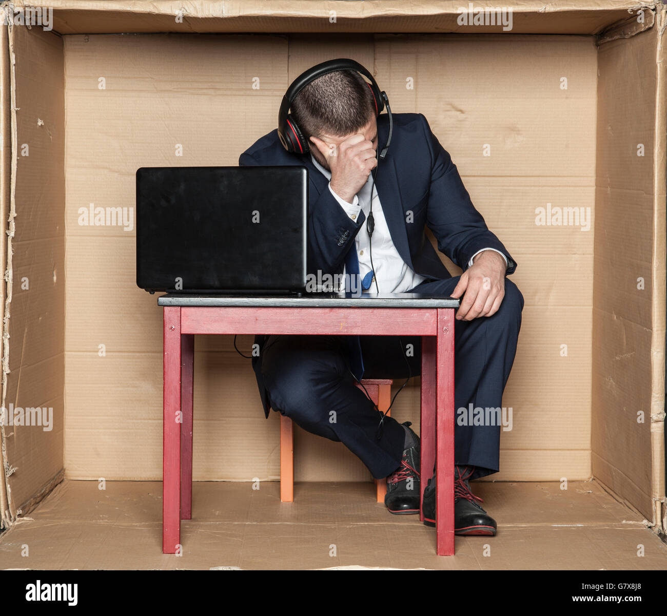 depressed employee sitting in the office Stock Photo - Alamy