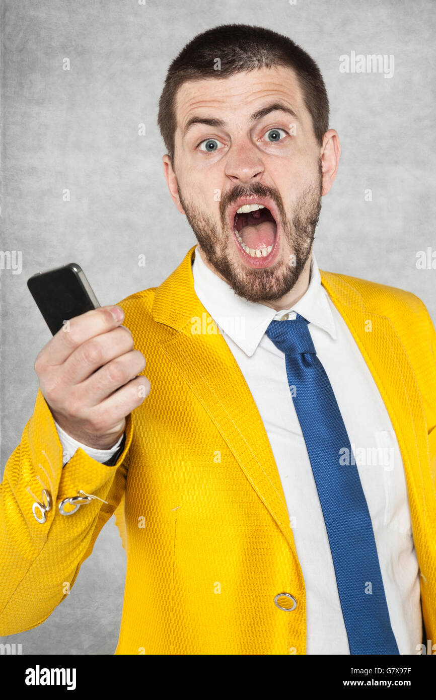 businessman screaming with anger Stock Photo - Alamy