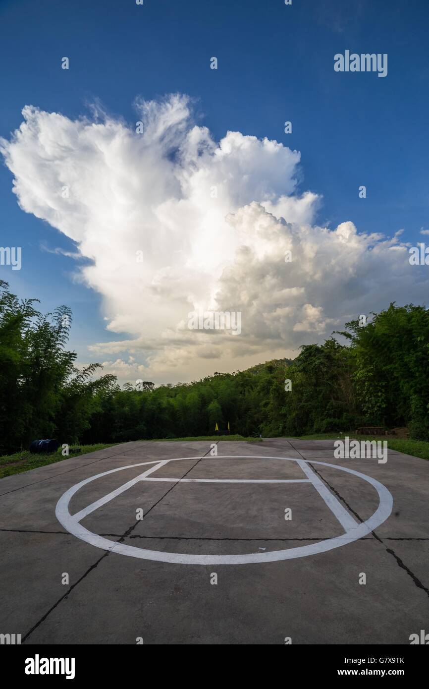 Helipad in the field in cloudy day Stock Photo - Alamy