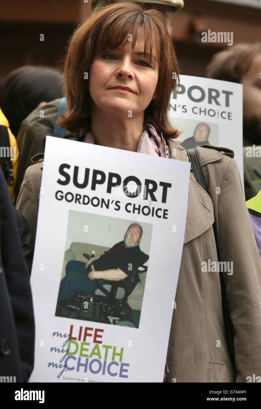 Gordon Ross's daughter Veronica with campaigners outside Parliament ...