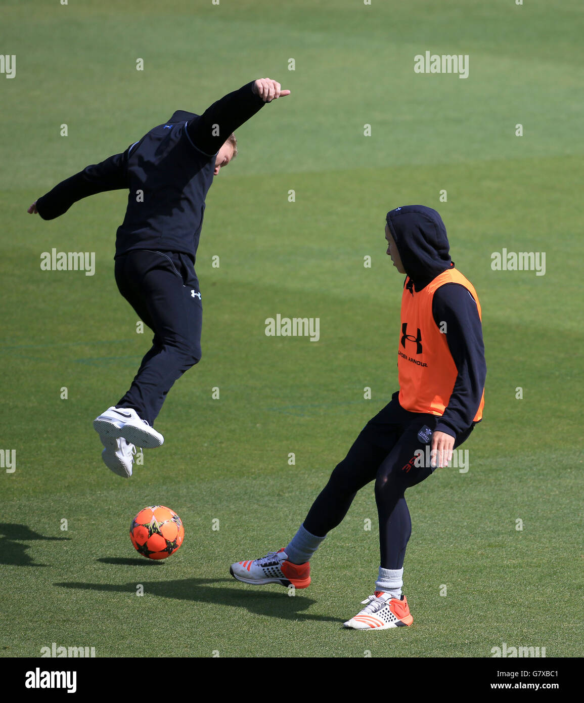 Surrey's Gareth Batty and Tom Curran (right) playing football during ...