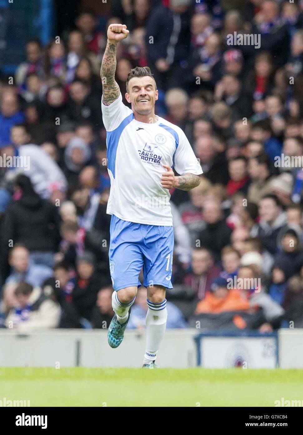 Queen of the South's Derek Lyle celebrates scoring during the Scottish ...