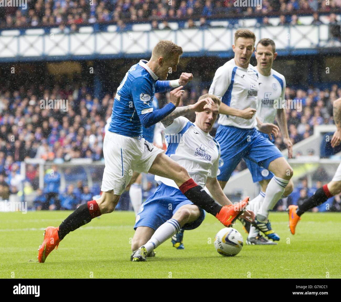 Rangers Dean Sheils (left) and Queen of the South's Kevin Holt (right ...
