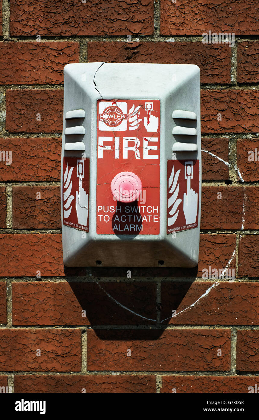 Old fire warning box with activation button Stock Photo - Alamy