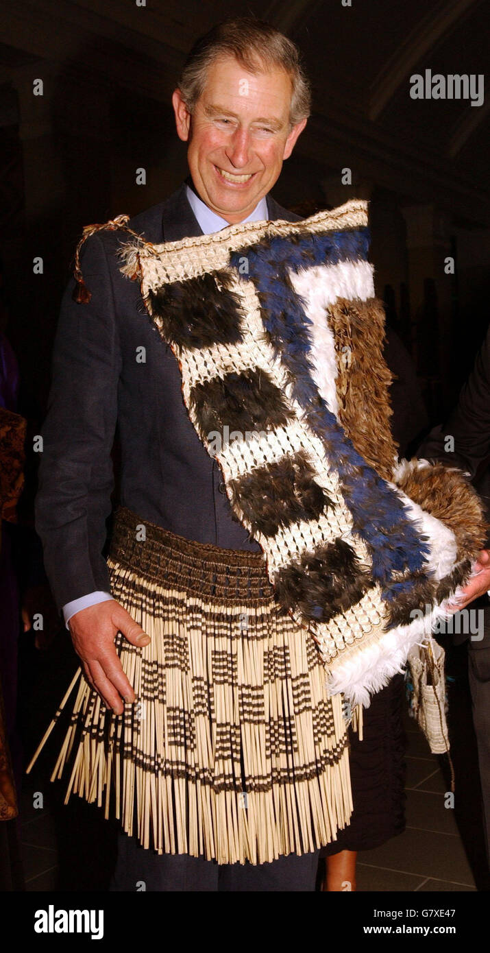 The Prince of Wales giggles as he wears a Maori Korowai cloak and Piu ...