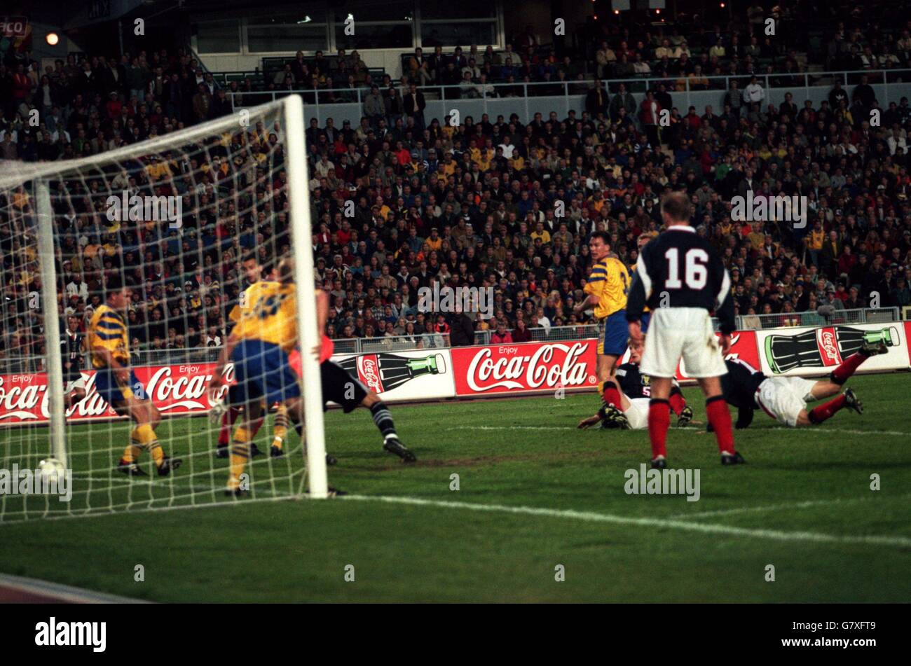Scotland's Kevin Gallacher puts his team back in the game by scoring ...