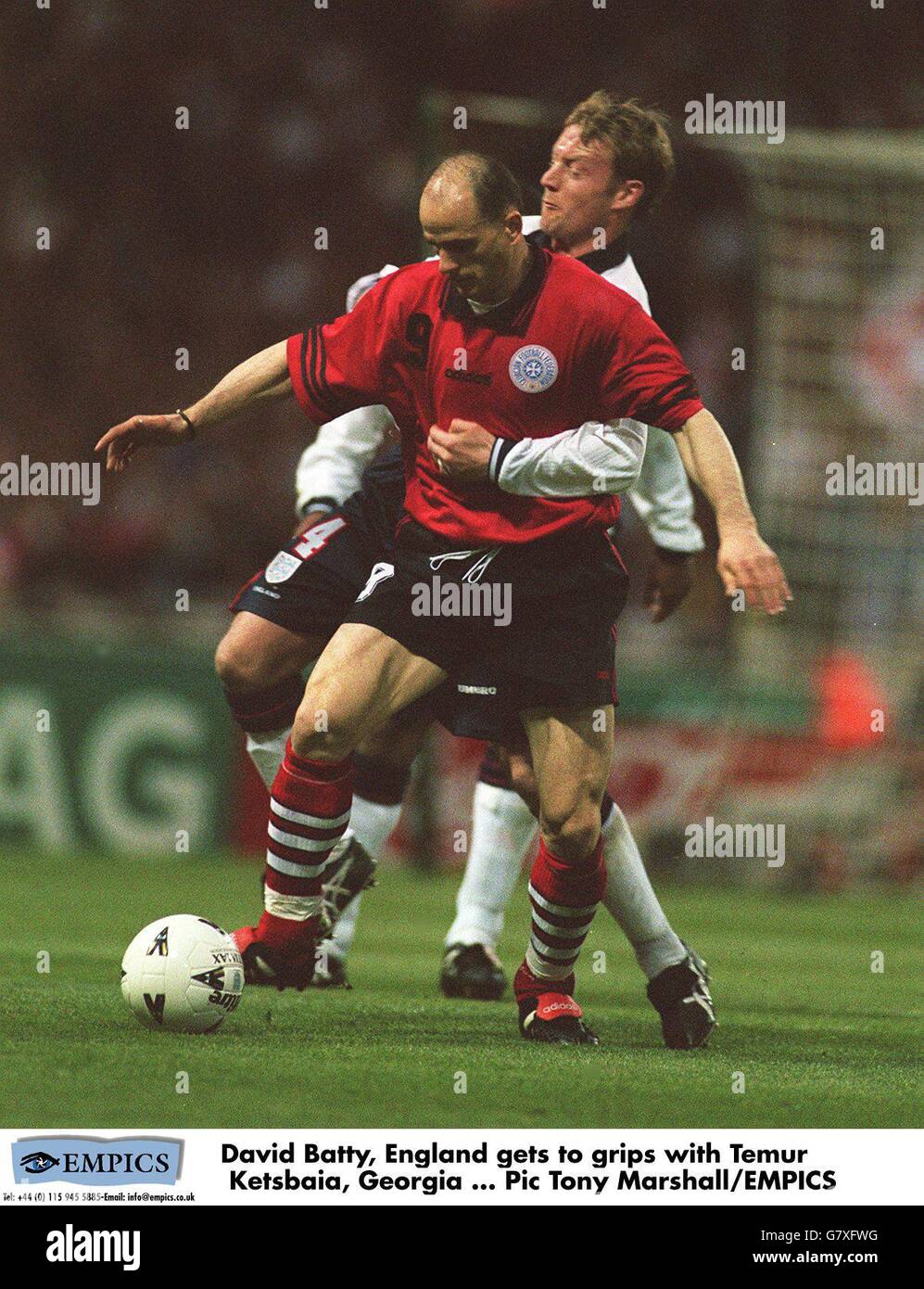 David Batty of England (back) gets to grips with Temur Ketsbaia ...