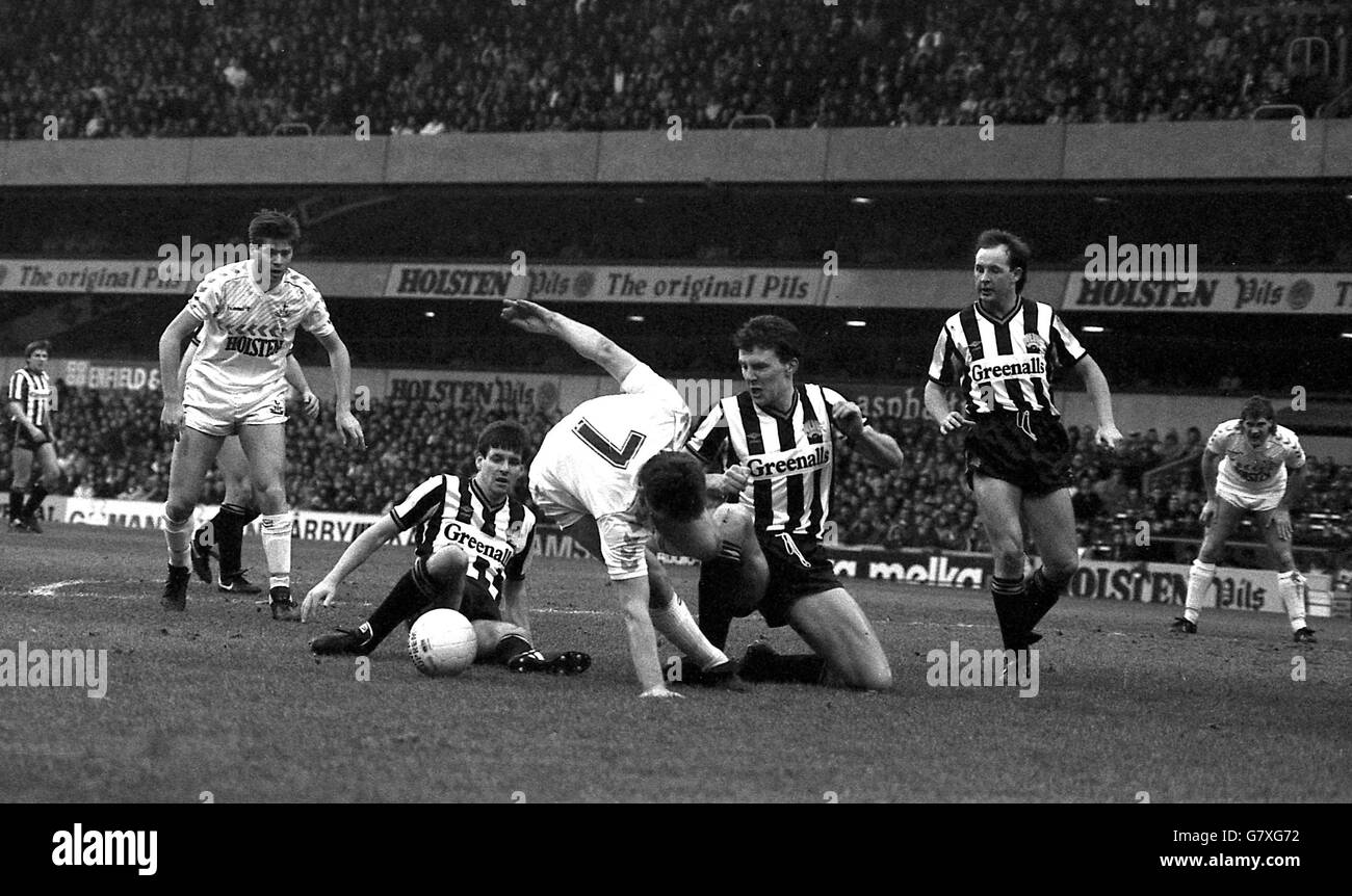 Tottenham Hotspur's Clive Allen (No.7) takes a tumble surrounded by ...
