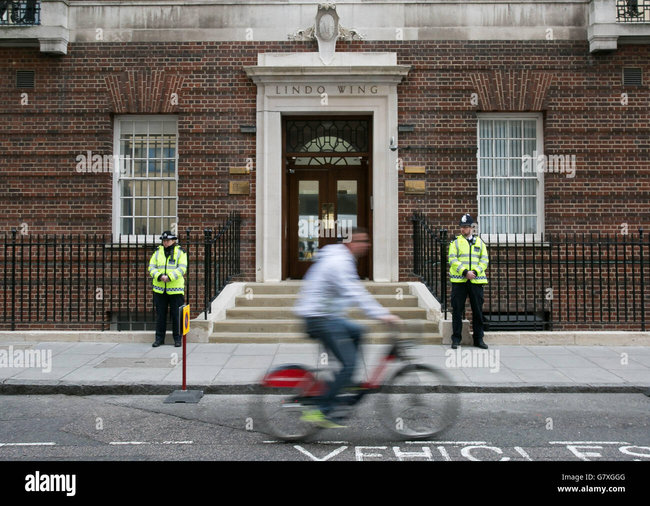 Police stand outside the Lindo wing of St Mary's Hospital in Paddington ...