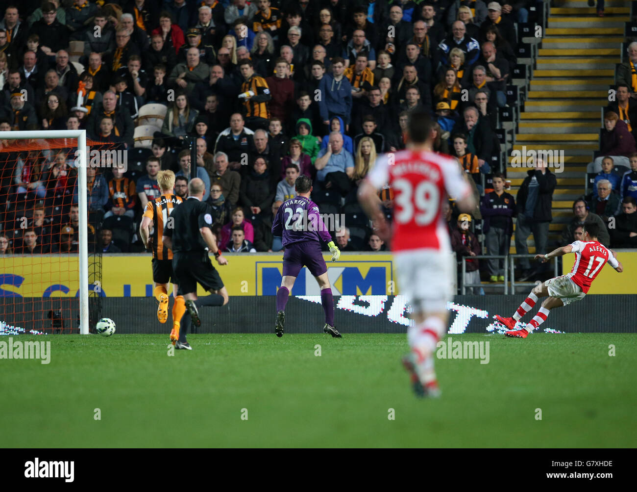 Arsenal's Alexis Sanchez scores his sides third goal during the ...