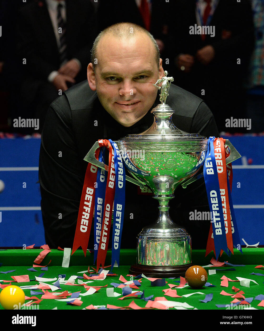 Stuart Bingham celebrates with the trophy after winning the final of ...