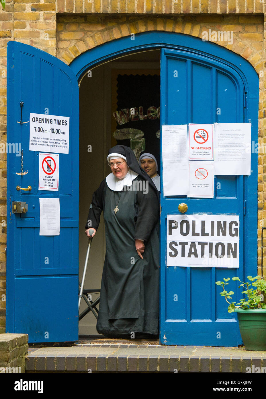 Nuns leave after voting at a polling station at St John's Church in ...