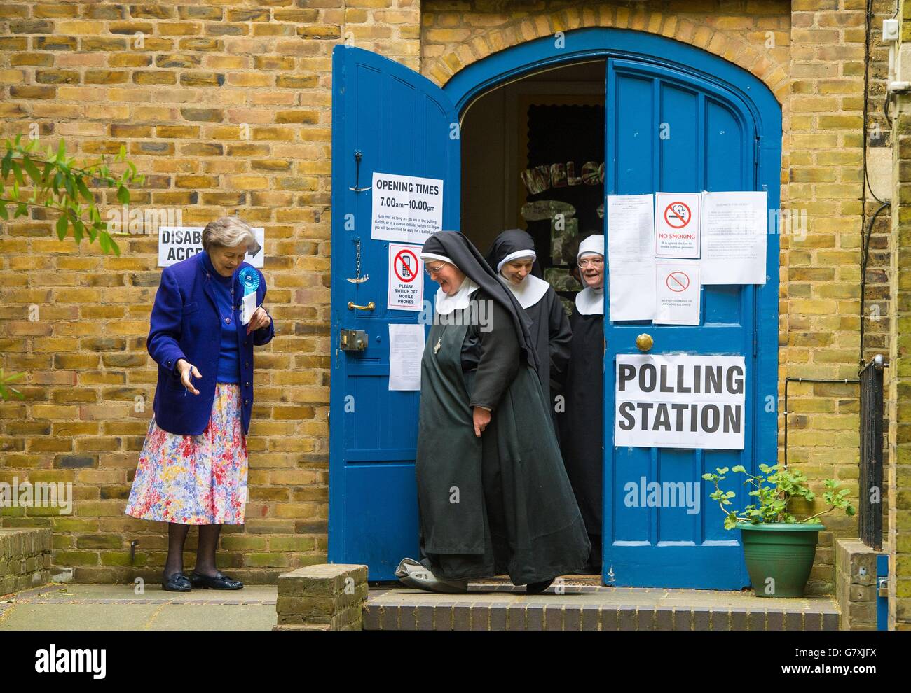 Nuns leave after voting at a polling station at St John's Church in ...
