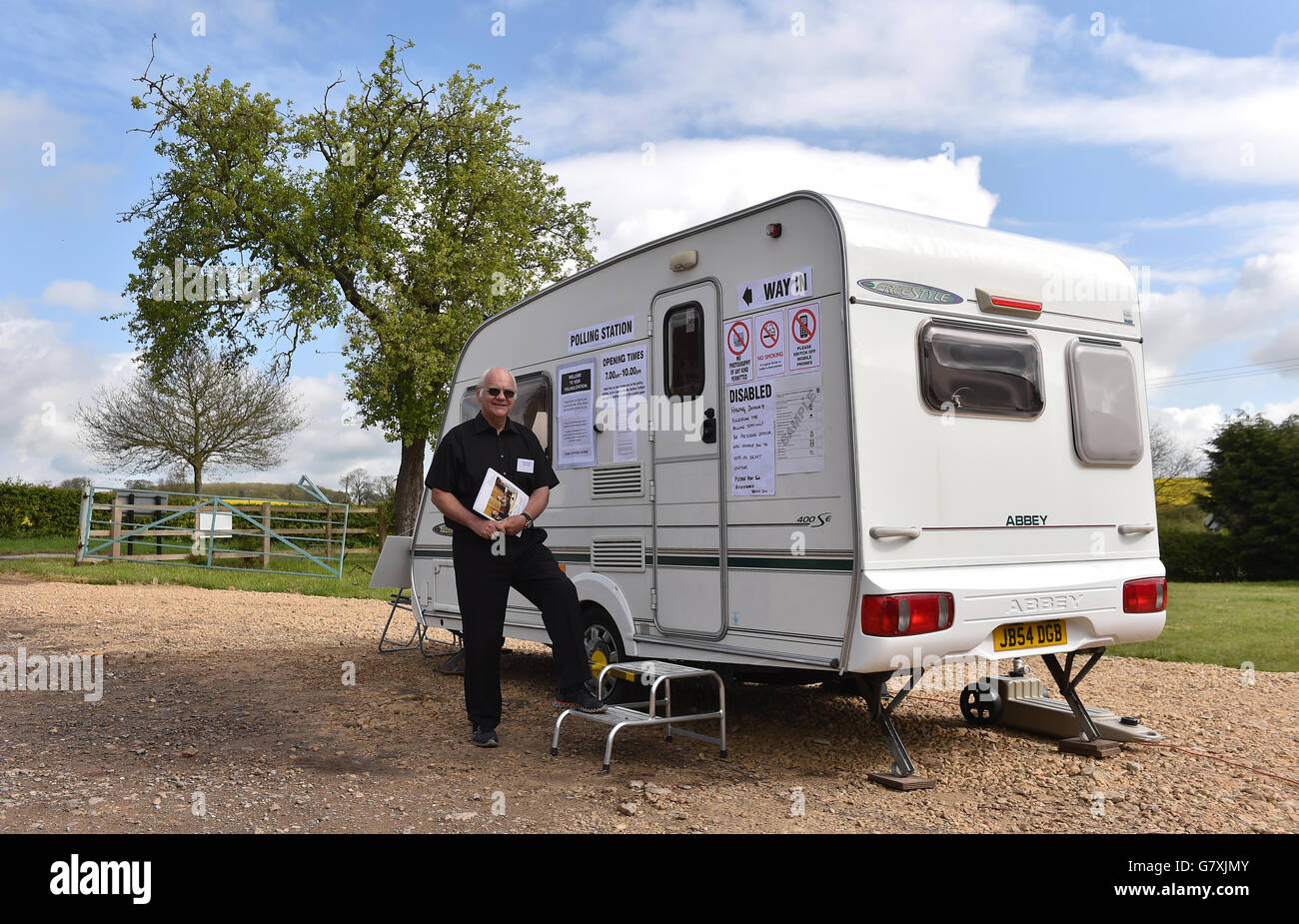 Presiding officer David Birch stands outside his caravan which is being ...