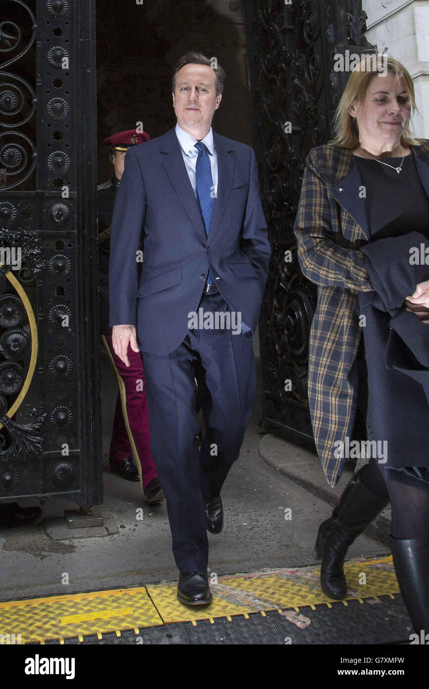 Prime Minister David Cameron returns to 10 Downing Street, following a ...