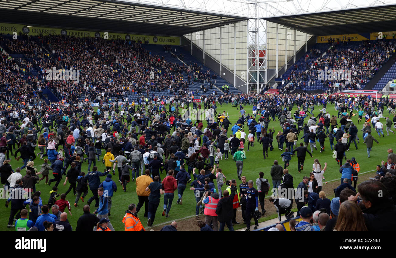 Preston North End fans invade the pitch after the final whistle during ...