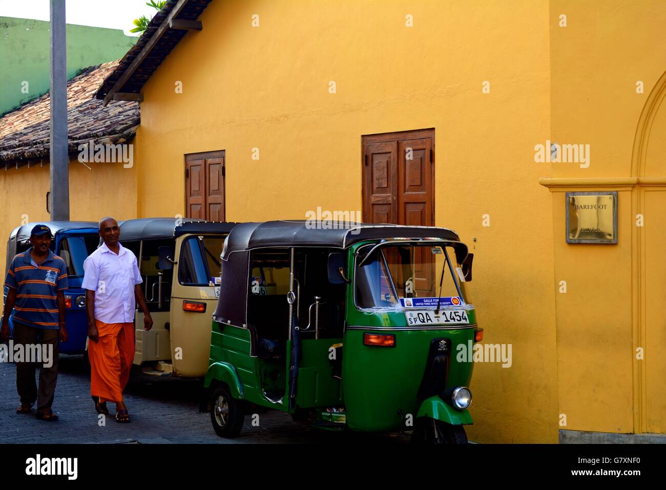 Green yellow tuk tuks hi-res stock photography and images - Alamy