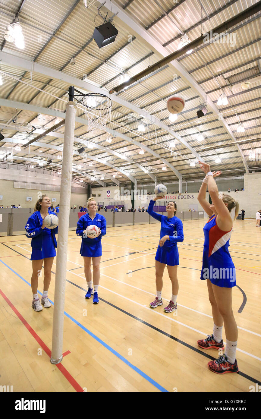 Netball players practice hi-res stock photography and images - Alamy