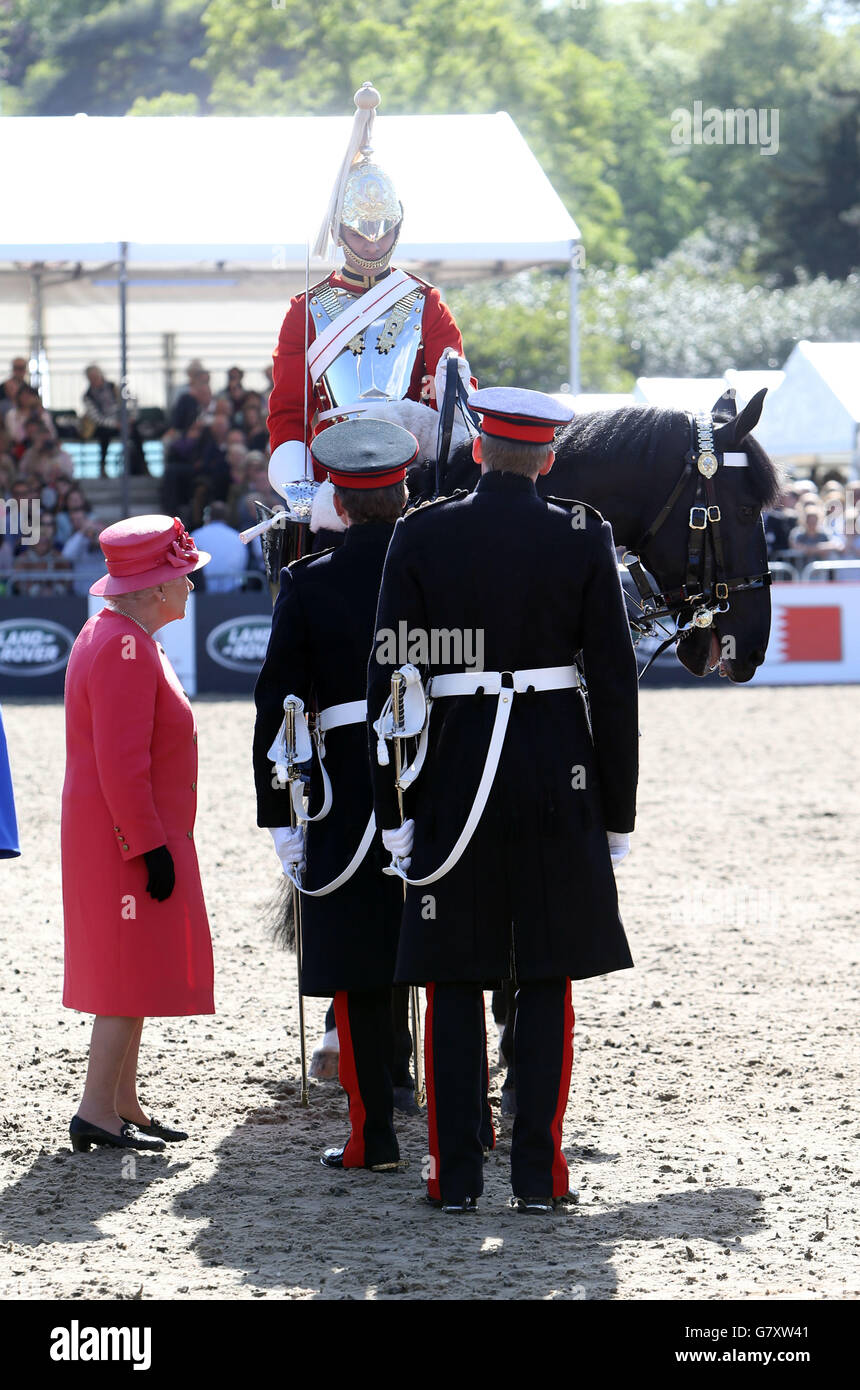 Queen Elizabeth II presents the trophy to the best turned out Trooper ...