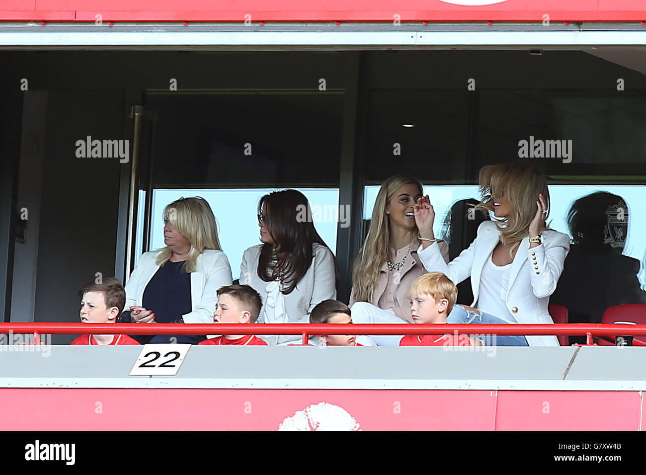 Alex Curran (far right), wife of Steven Gerrard applauds as he walks ...