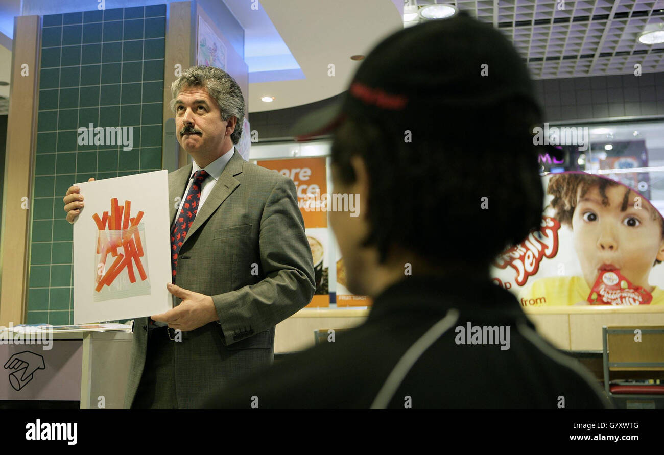 Dominic O'Brien uses a memory card to teach the employees some memory ...