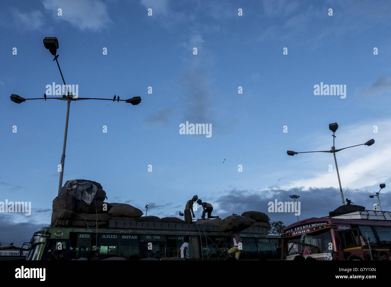 Bus with goods on the roof hi-res stock photography and images - Alamy