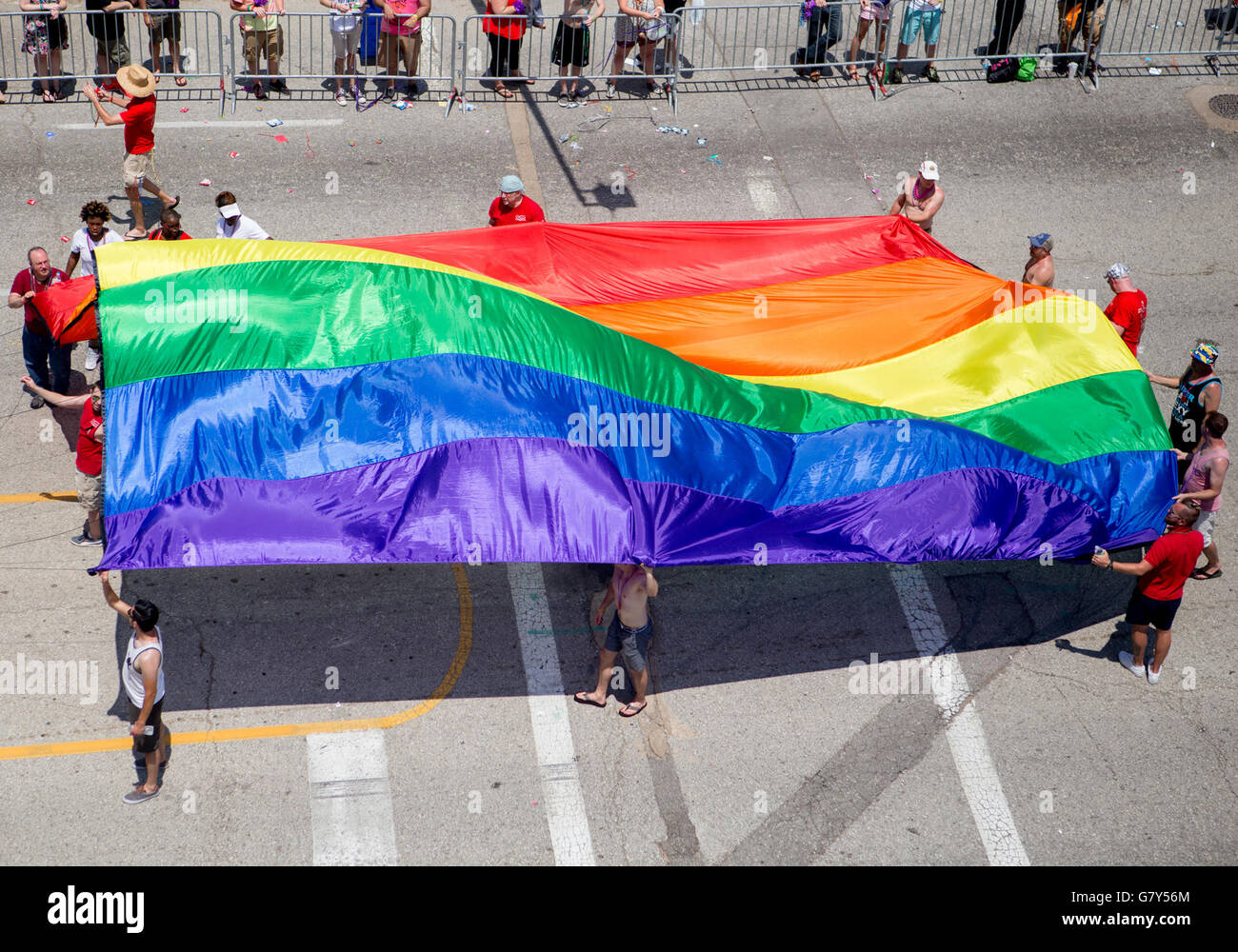 St. Louis, Missouri, USA. 26th June, 2016. Parade-goers carry a rainbow ...
