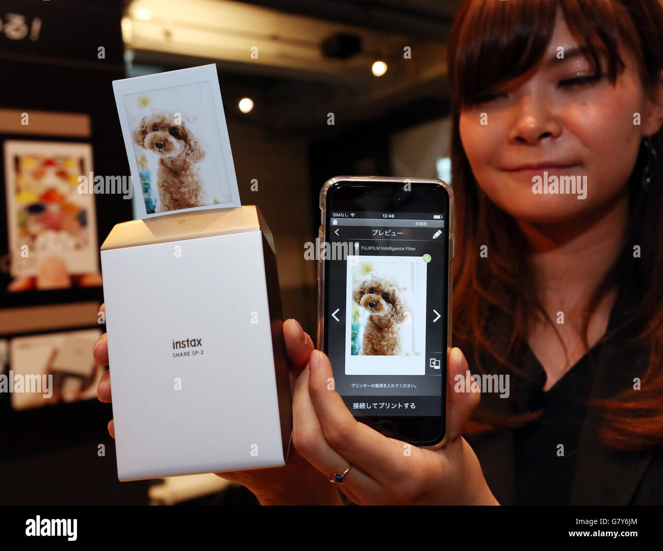 Tokyo, Japan. 27th June, 2016. Japanese camera giant Fujifilm employee ...