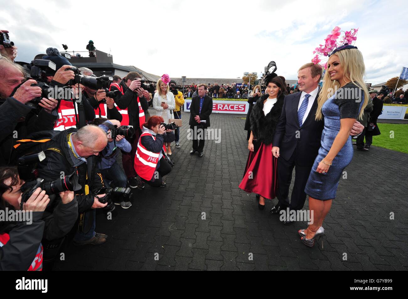 Taoiseach Enda Kenny poses with with Best Dressed Lady Kirsty Farrell ...