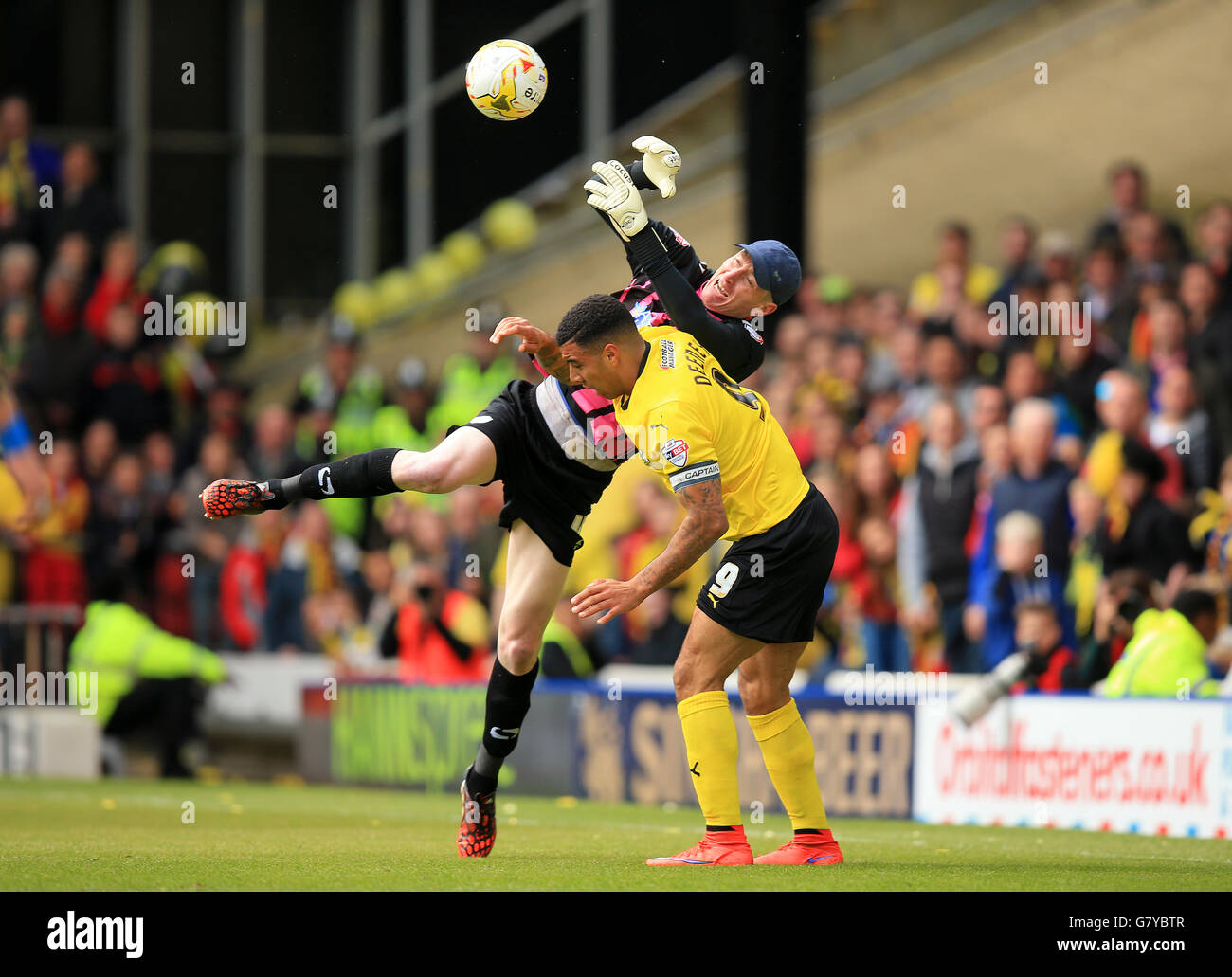 Watford's Troy Deeney (left) and Sheffield Wednesday goalkeeper Chris ...
