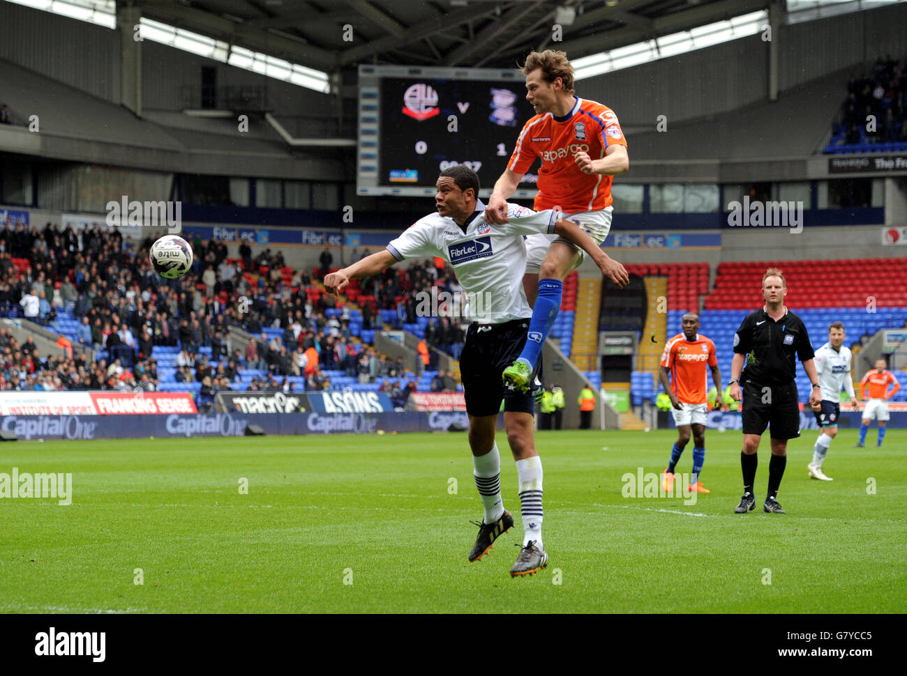 Birmingham City's Jonathan Spector wins a header in the air ahead of ...