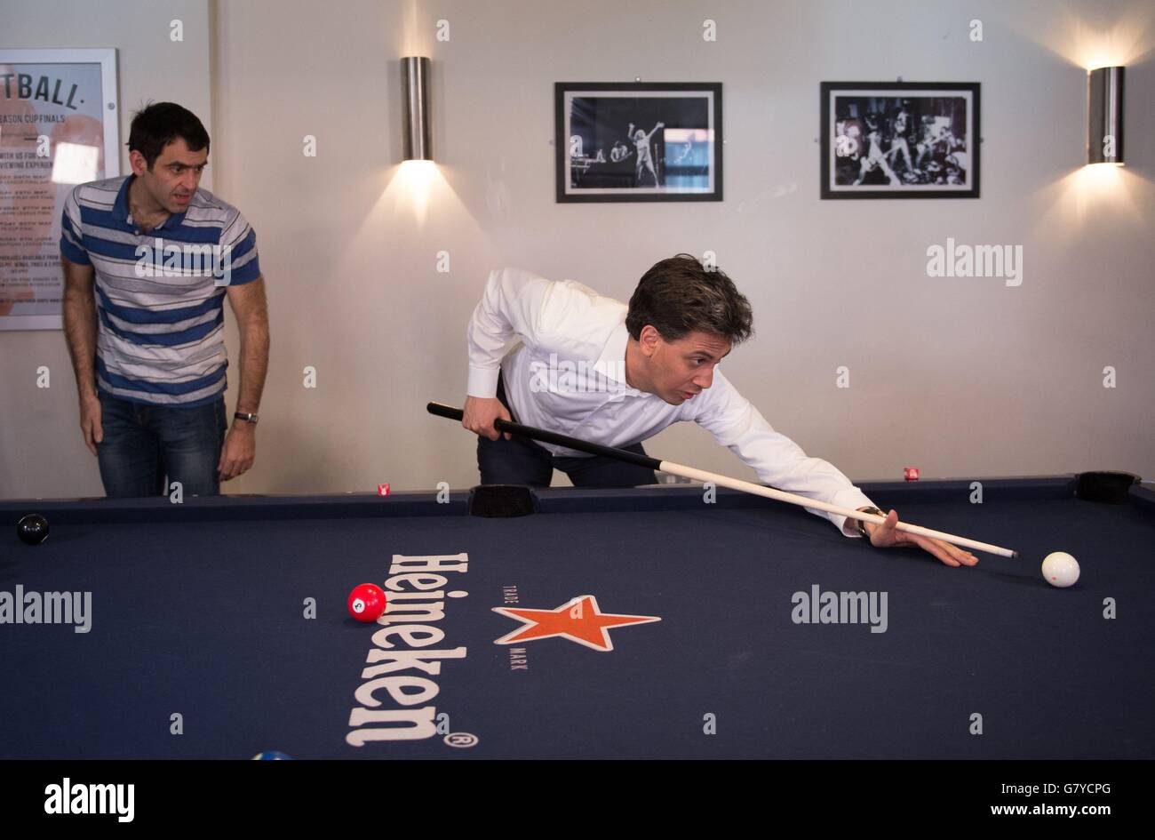 Labour leader Ed Miliband playing pool with Snooker player Ronnie O ...