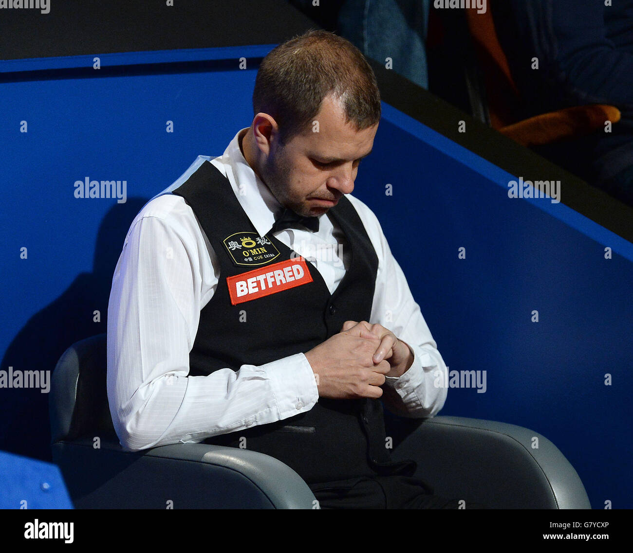 Barry Hawkins sits in his chair in his semi final match against Shaun ...