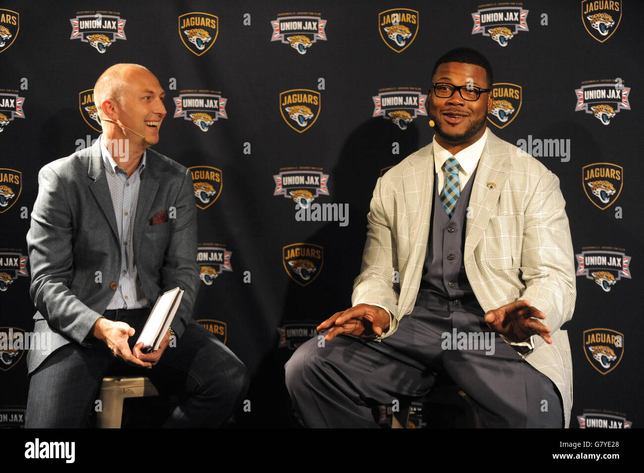 Former Jaguars player Marcus Stroud (right) on stage during the NFL ...
