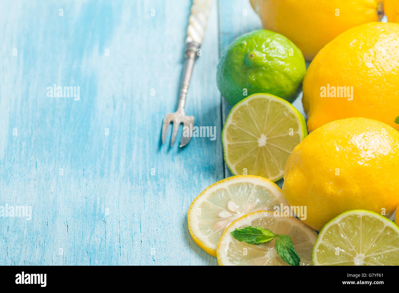 Fresh slice lemon with salt over the blue wooden table, top view Stock ...