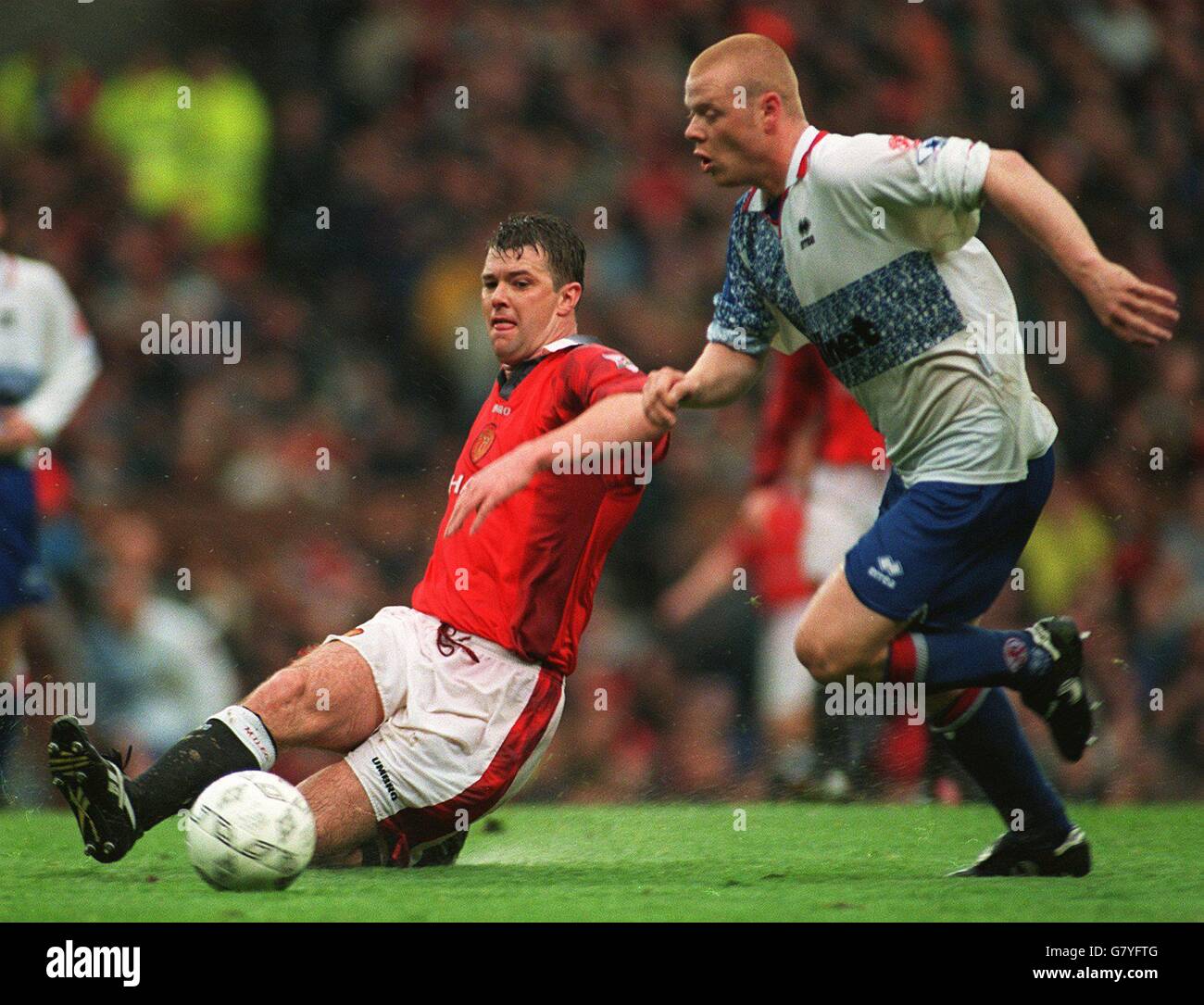 Manchester united slides in on phil stamp hi-res stock photography and ...