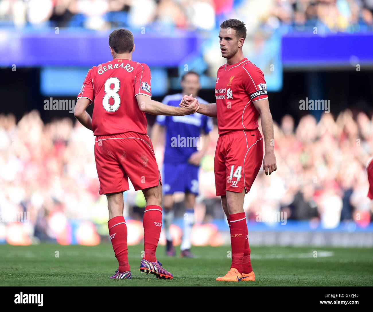 Liverpool's Steven Gerrard with Liverpool's Jordan Henderson Stock ...