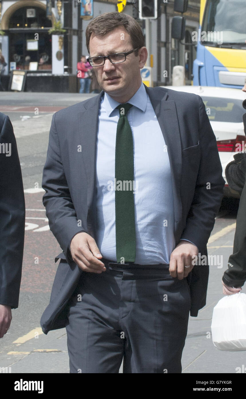 Former News of the World editor Andy Coulson leaving the High Court in ...