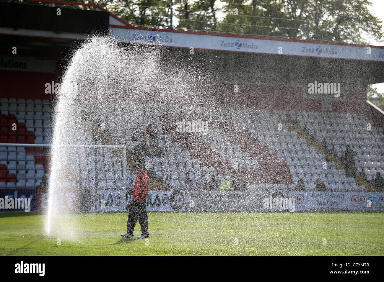 The sprinkler system at the lamex stadium before the game hi-res stock ...