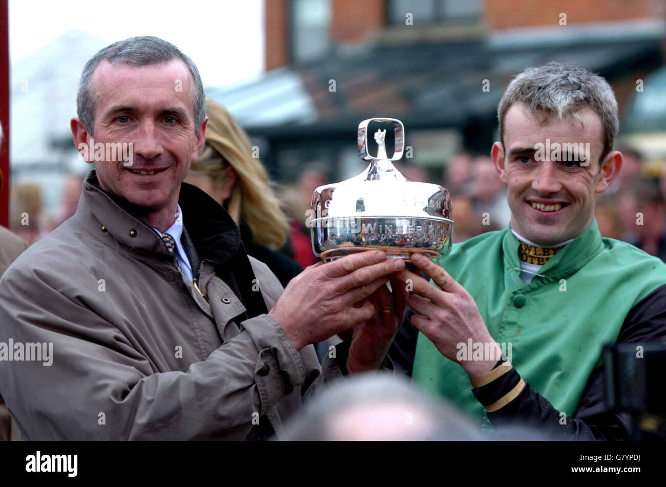 Jockey Ruby Walsh (R) and trainer Martin Brassil with the trophy after ...