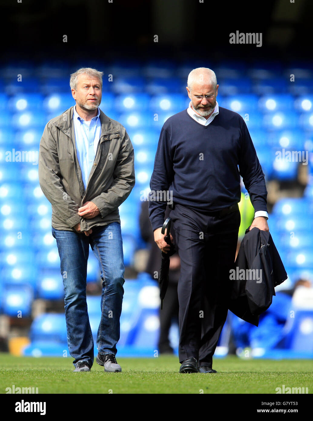 Chelsea owner Roman Abramovich (left) on the pitch after the Barclays ...